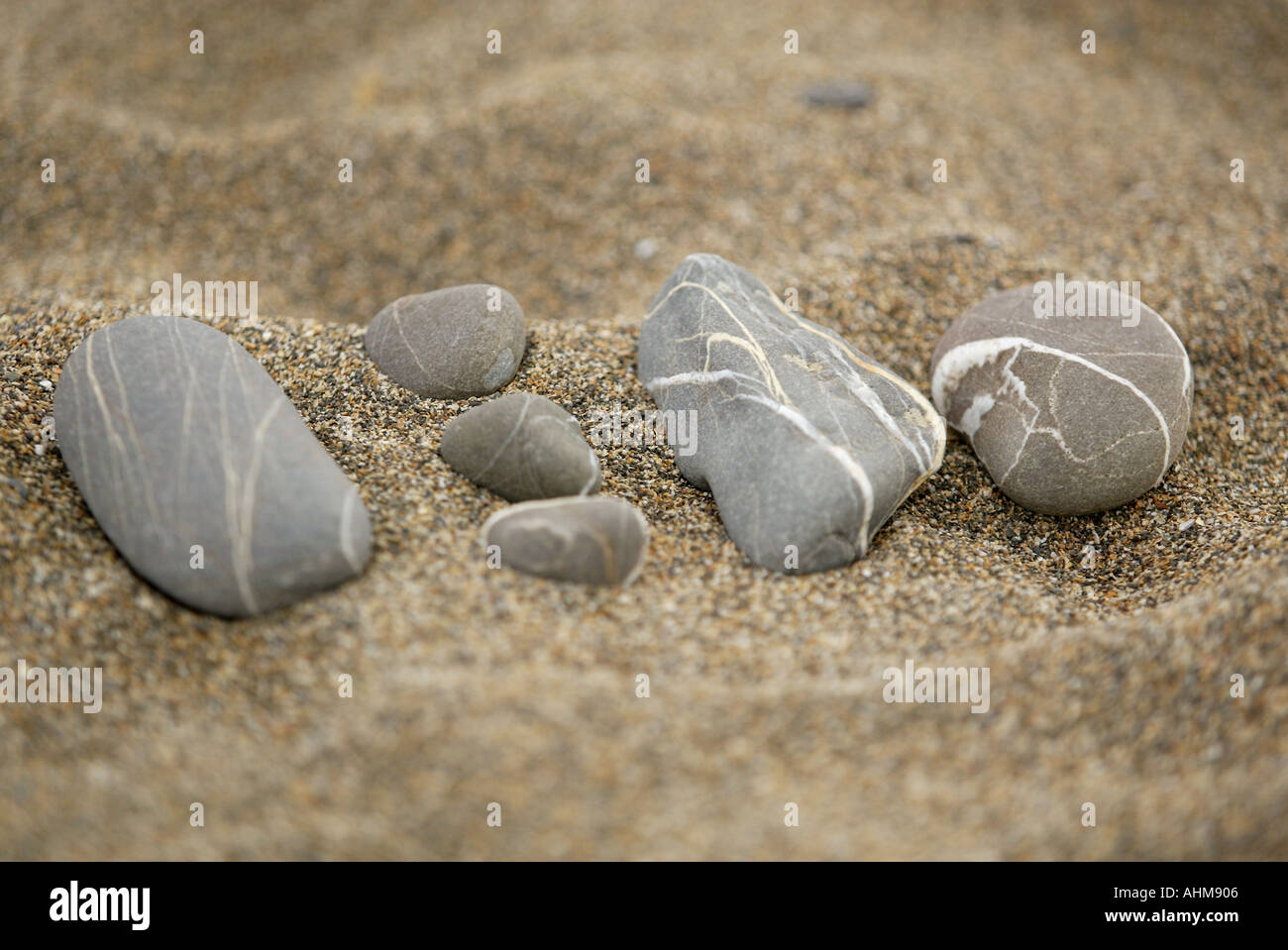 6 Stones on beach Stock Photo - Alamy