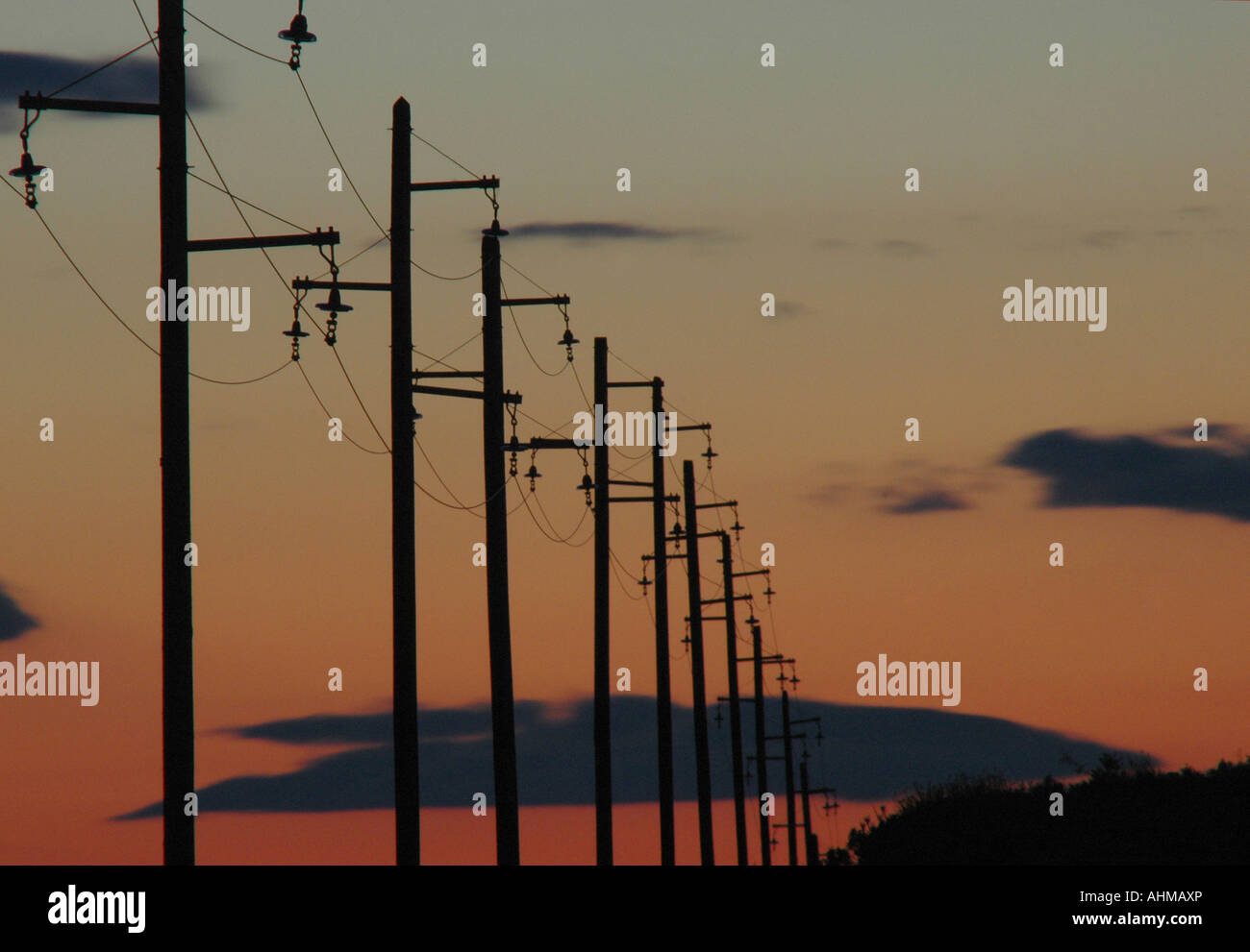 Power lines at sunset Stock Photo - Alamy
