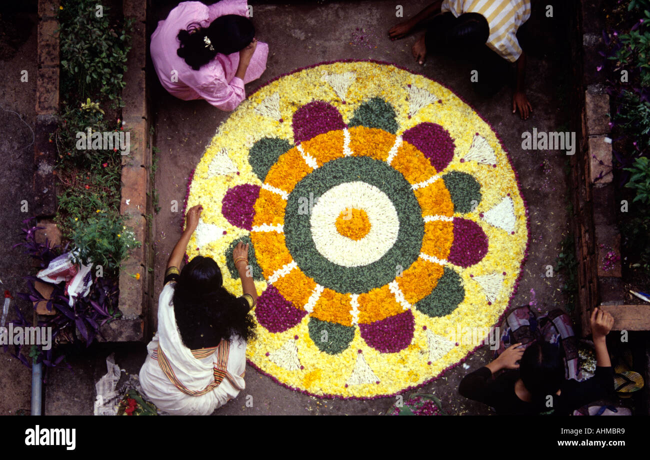 People putting pookkalam hi-res stock photography and images - Alamy