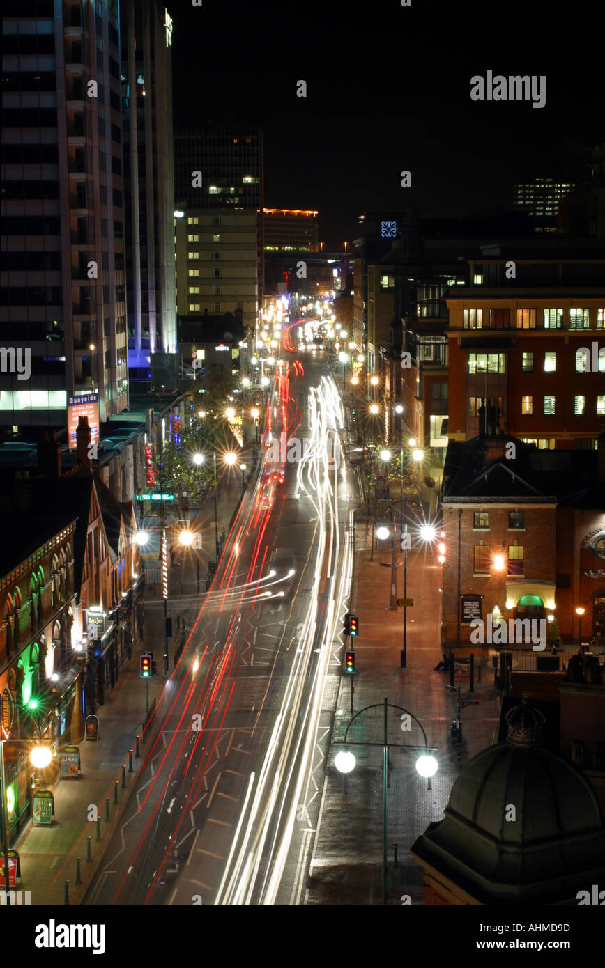 Traffic on a busy street showing traffic trails from the car lights ...