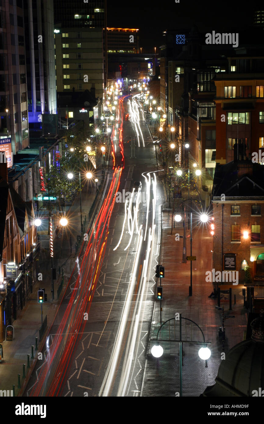 Traffic on a busy city street showing traffic trails from the car ...
