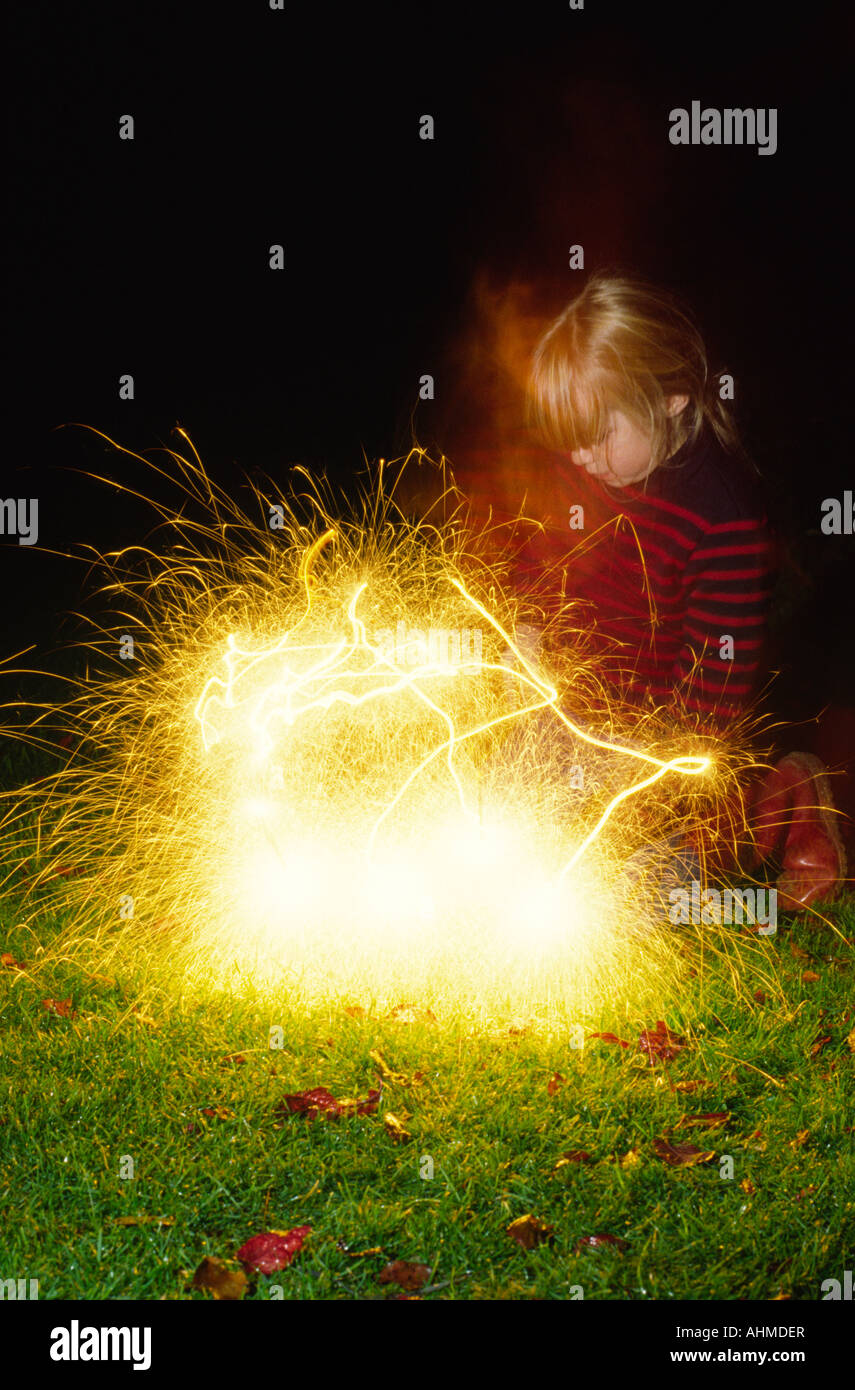 Firework Safety young child with sparkler Stock Photo - Alamy