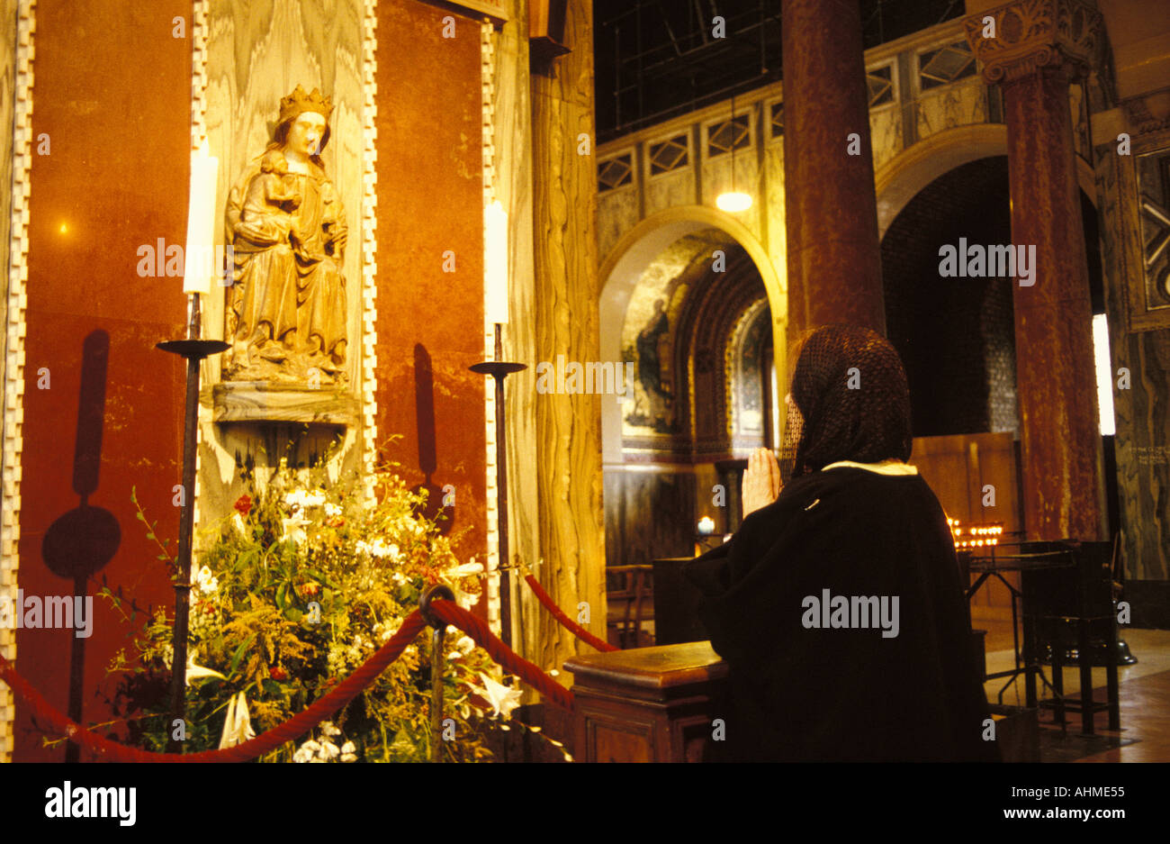 Woman praying westminster cathedral london england hi-res stock ...