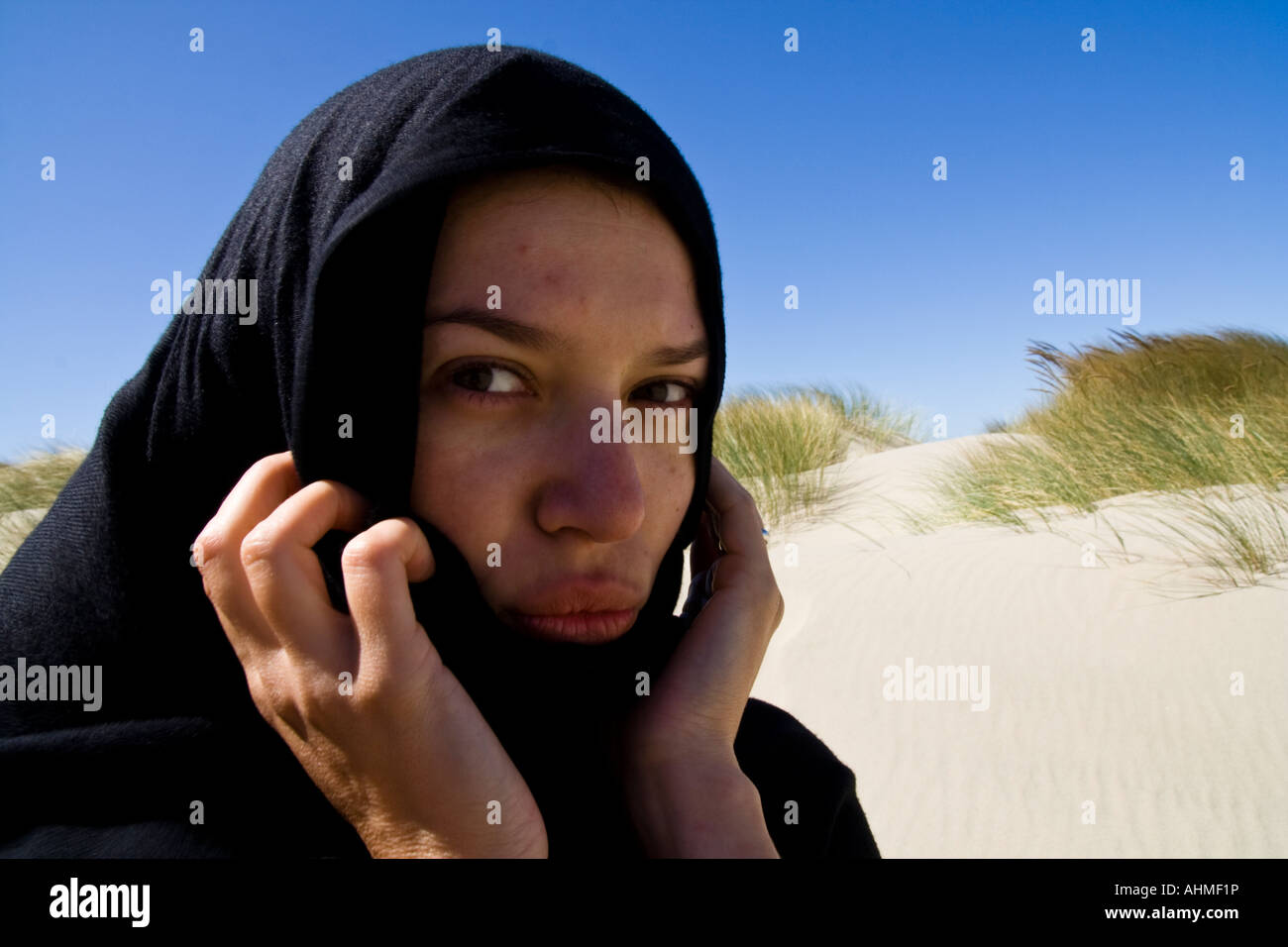Young woman dressed in burka on the beach in Florence, Oregon Stock ...