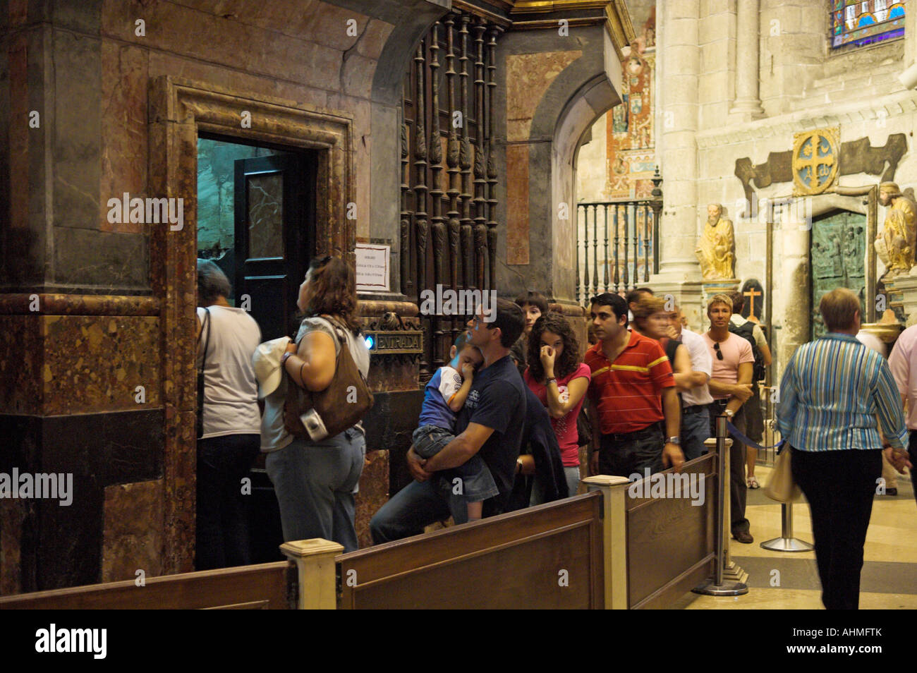 Visitors queuing crypt of the Apostle St James Cathedral Santiago de ...