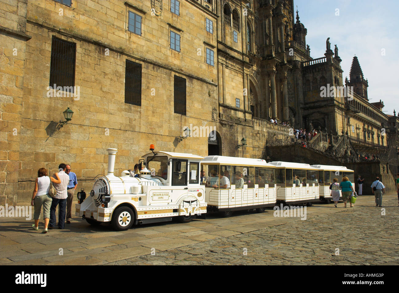 Sightseeing little road train outside Cathedral Santiago de Compostela ...