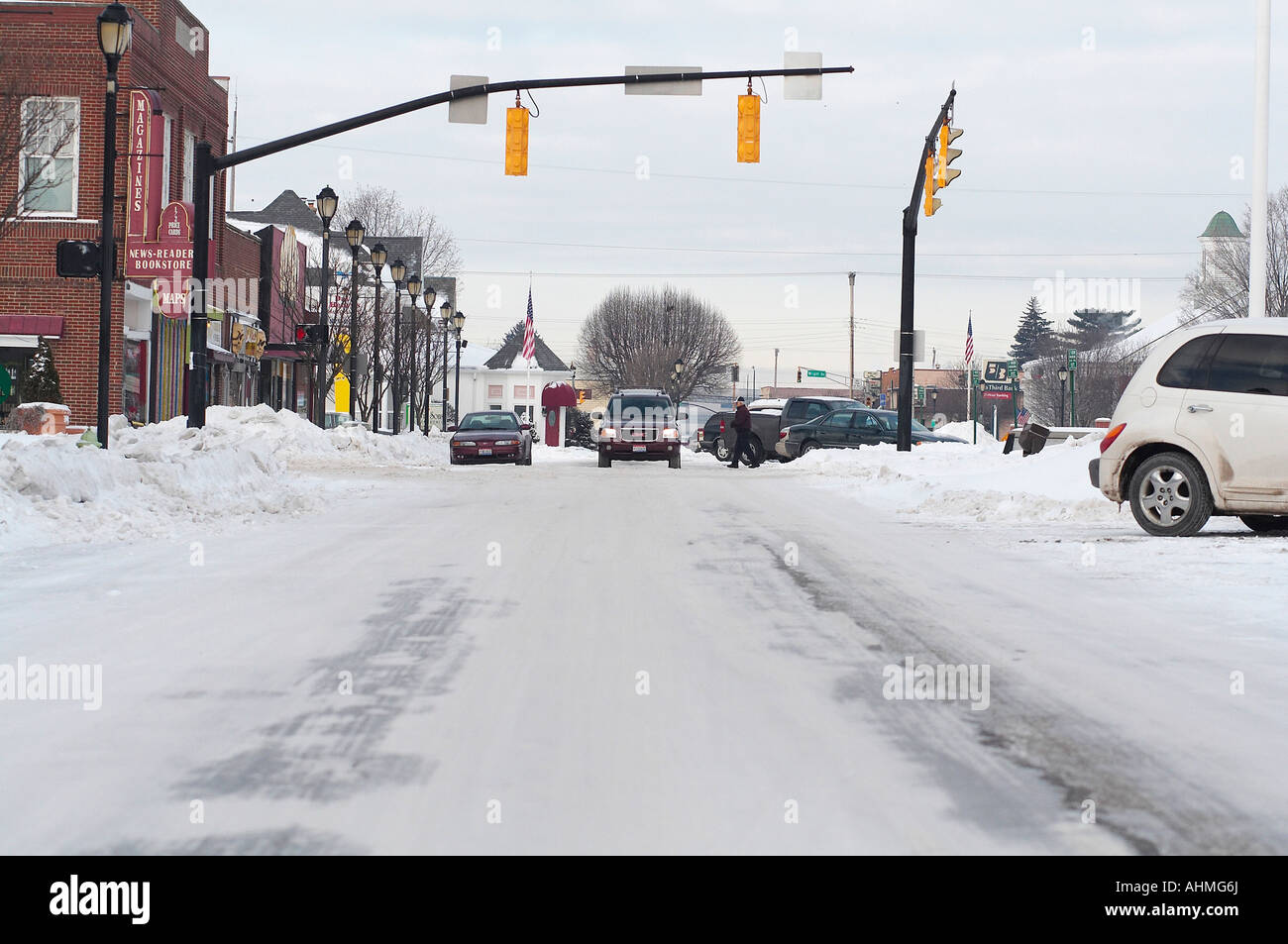 Cars on a snow covered road in the midwestern United States Stock Photo ...