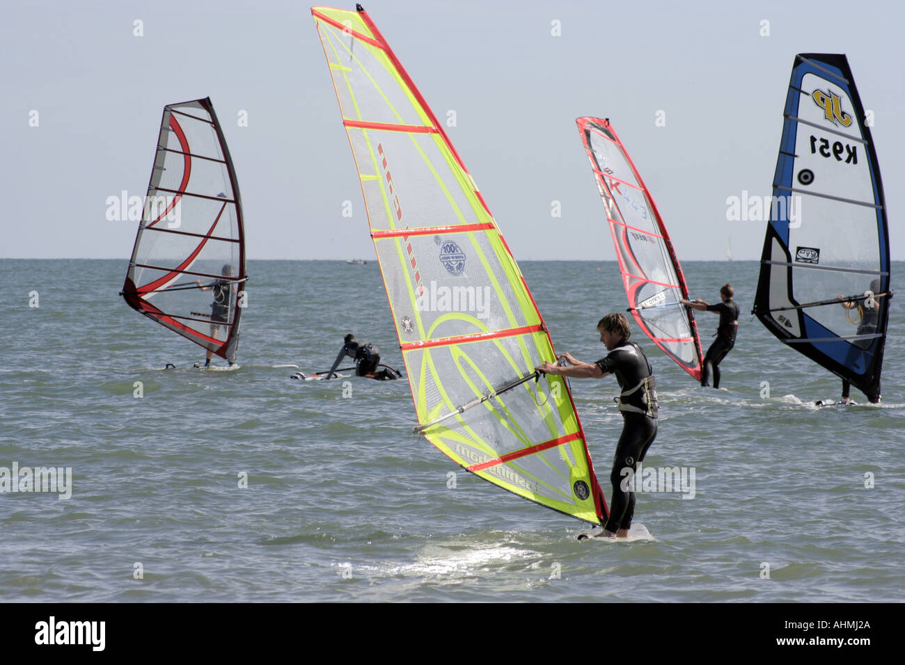 Windsurfing windsurfer school on the Hampshire coast England UK Stock ...