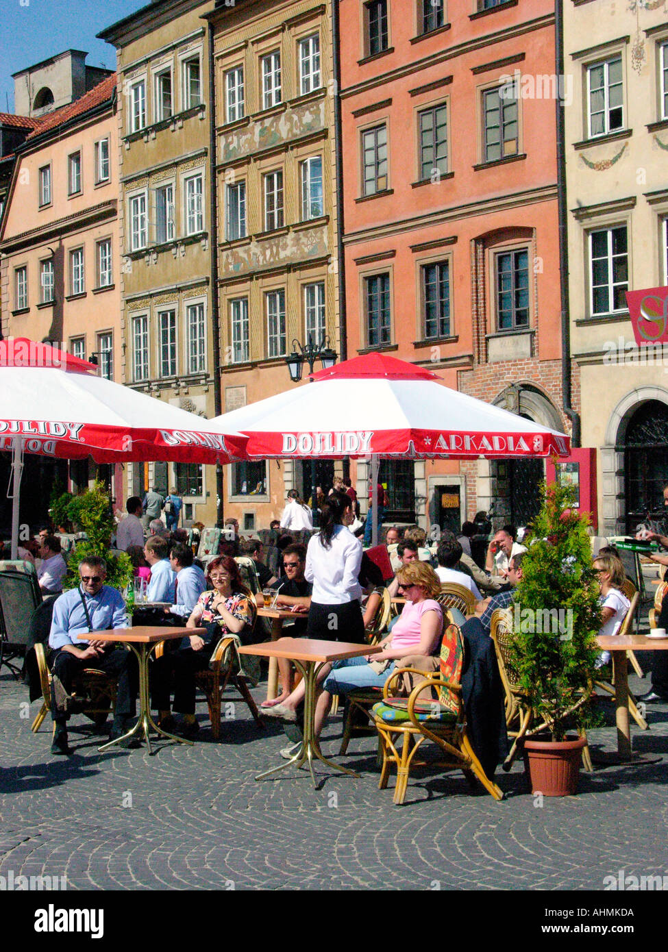 cafes in warsaw's old town square poland Stock Photo - Alamy