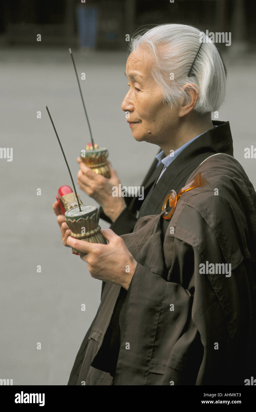 China Shanghai Longhua Buddhist Temple ceremony old lady Stock Photo ...