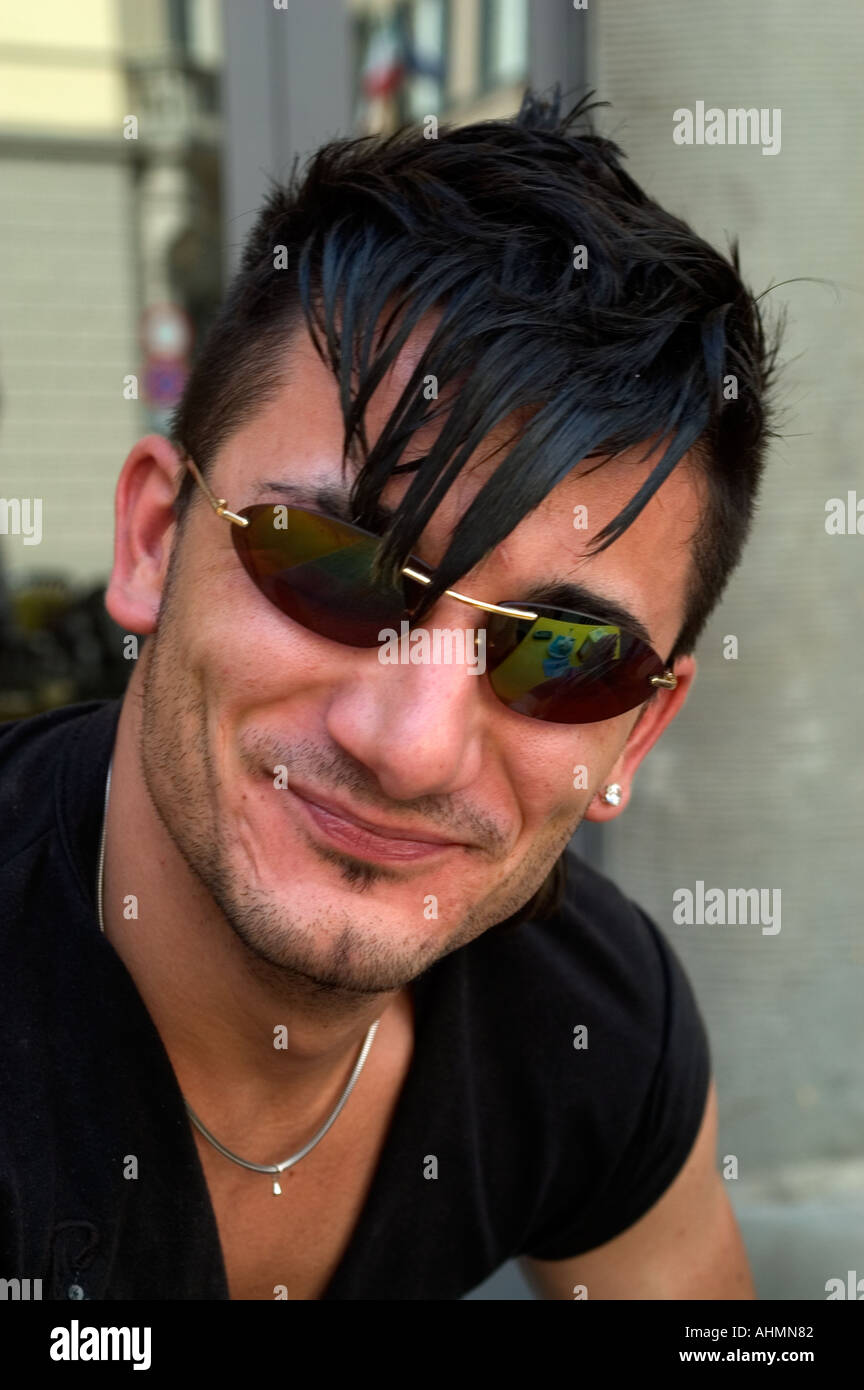 Tuscany Italy man boy teenager smile fashion Italian sun glasses Stock ...