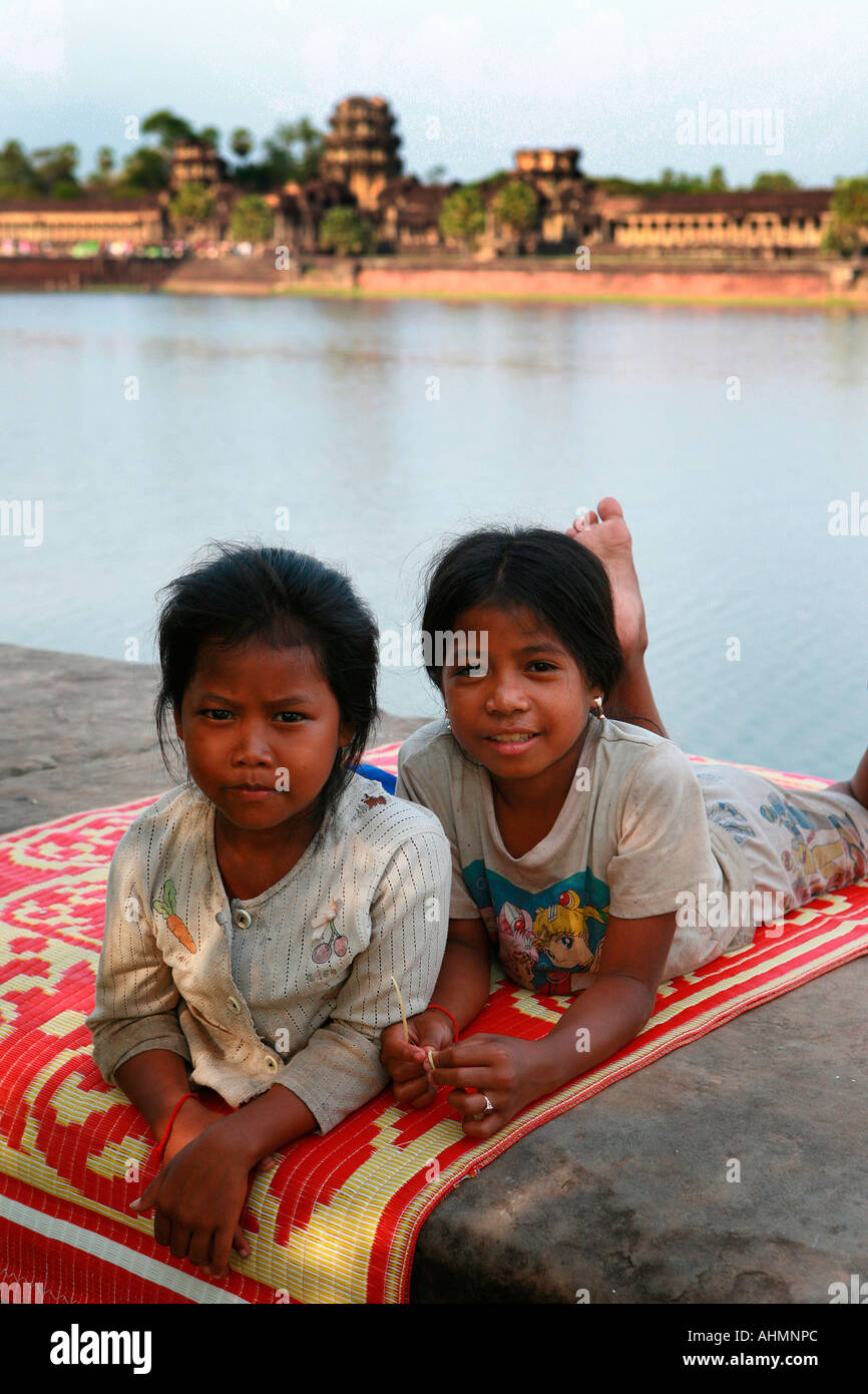 Khmer girls in front of the moat at Angkor Wat, Siem Reap, Cambodia ...