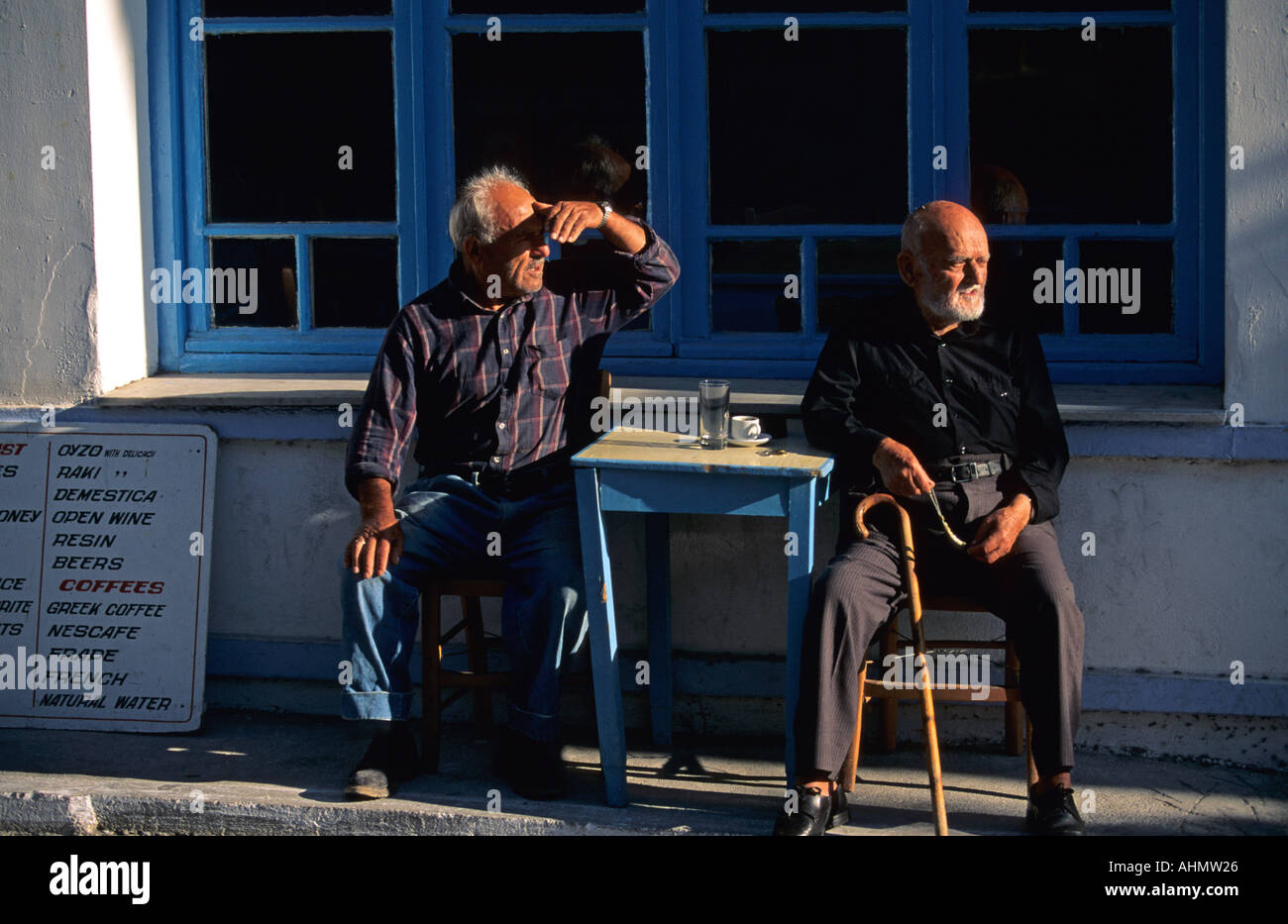 greece crete greek faces two men sitting outside a taverna Stock Photo ...