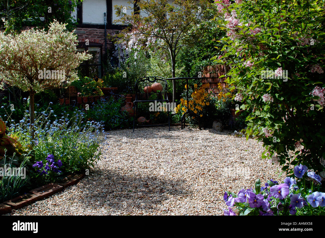 The garden path of an English cottage garden Stock Photo - Alamy