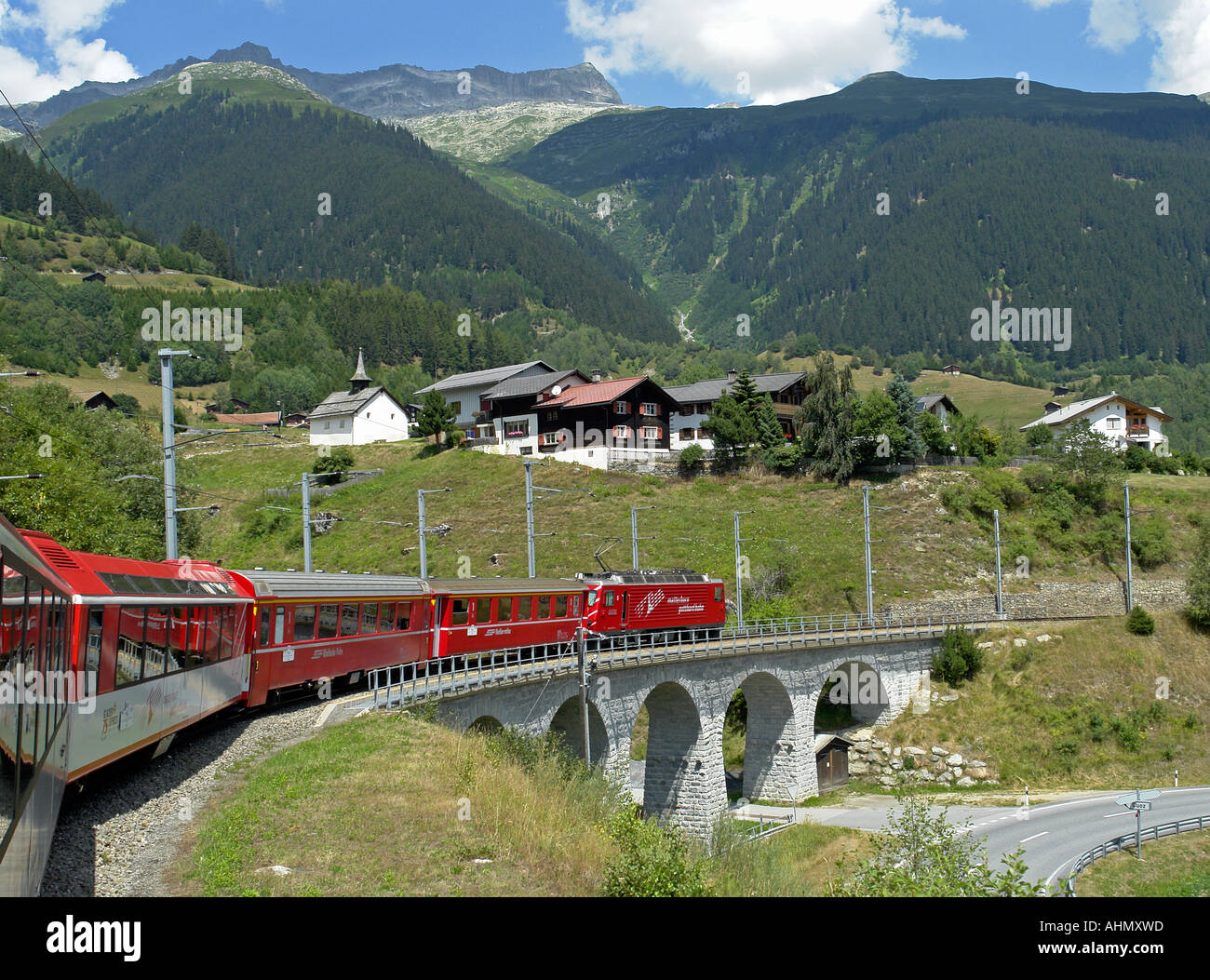 Glacier Express train approaching Disentis/Muster from Zermatt Stock ...