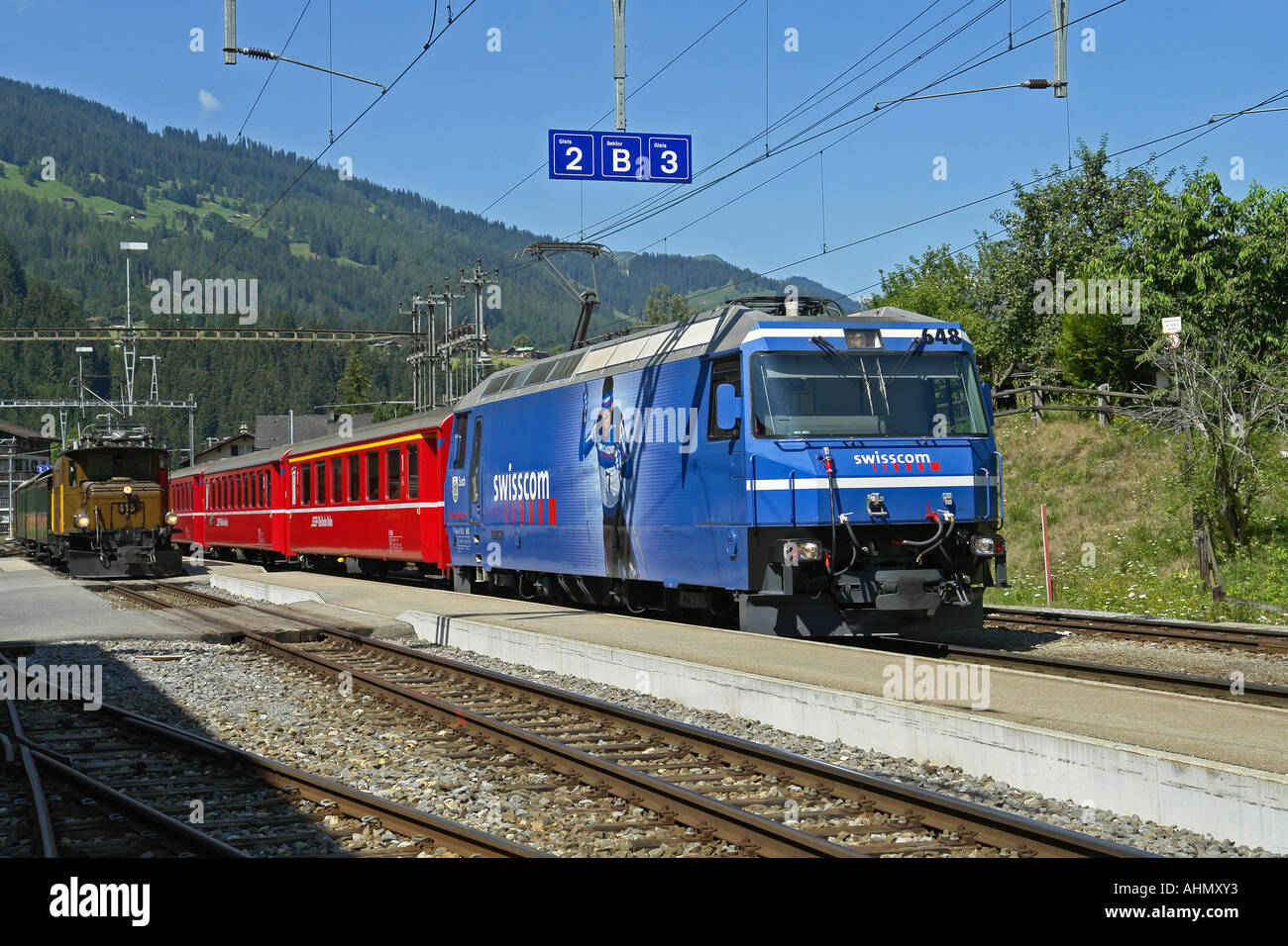 Rhatische Bahn passenger train arriving in Grusch en route to Davos and ...