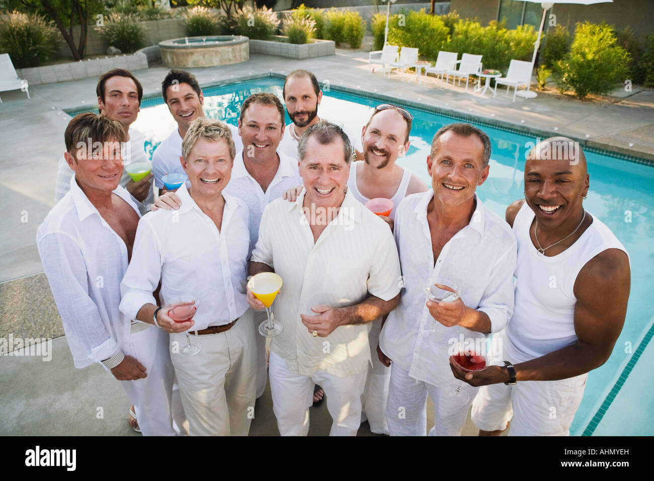 Men socializing swimming pool hi-res stock photography and images - Alamy