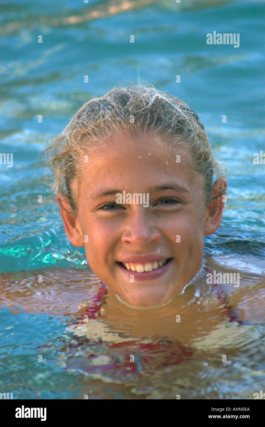 smiling girl in pool Stock Photo - Alamy