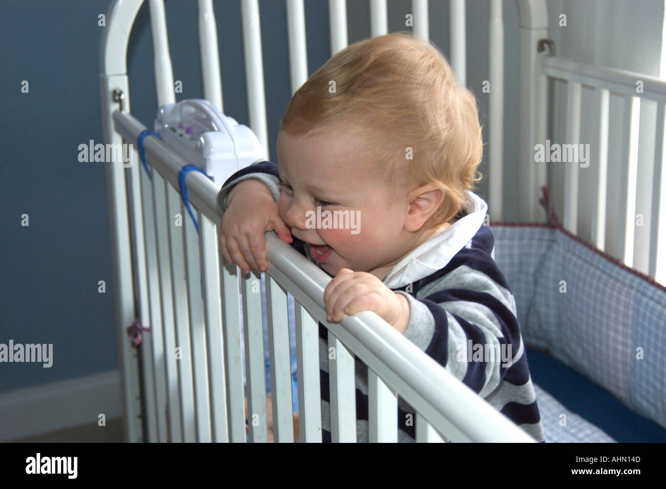 happy baby in crib Stock Photo - Alamy