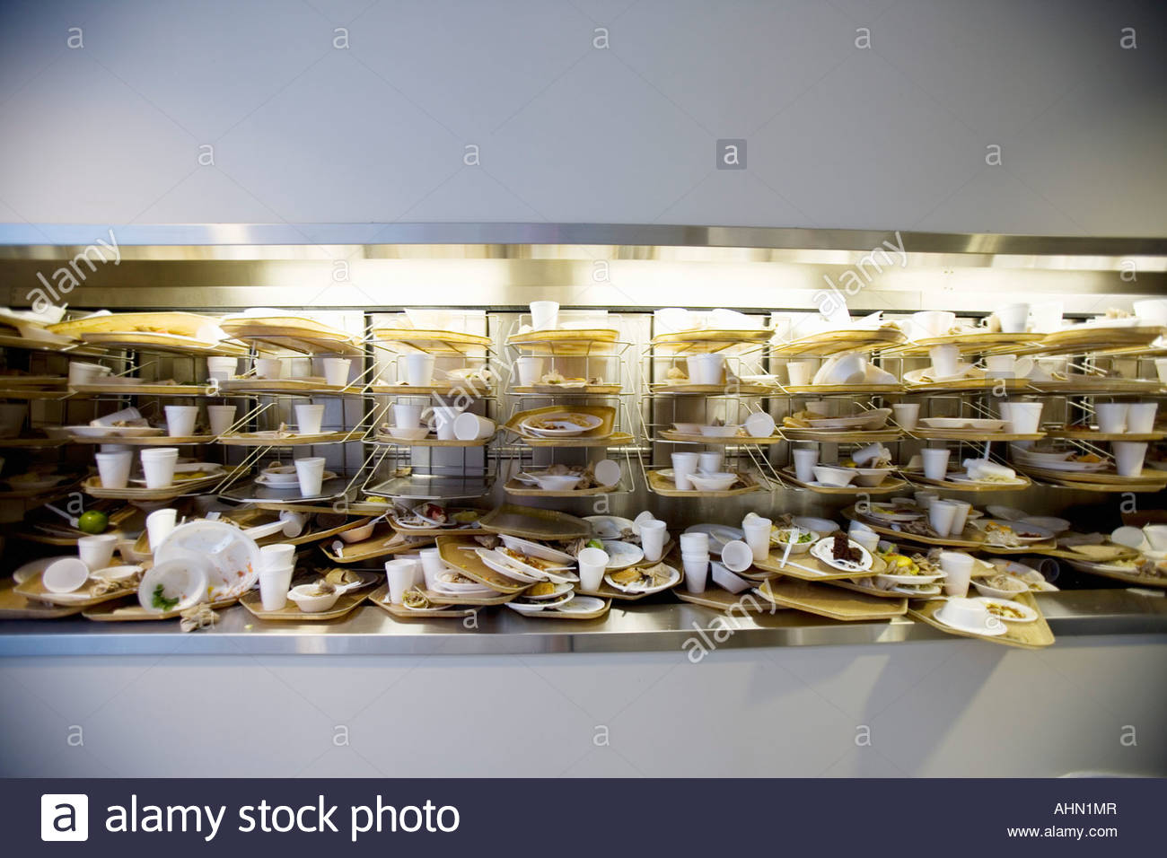 Stack of dirty cafeteria trays Stock Photo: 14510854 - Alamy