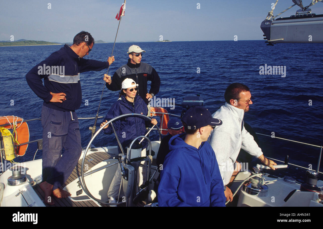 sailing crew with skipper Stock Photo - Alamy