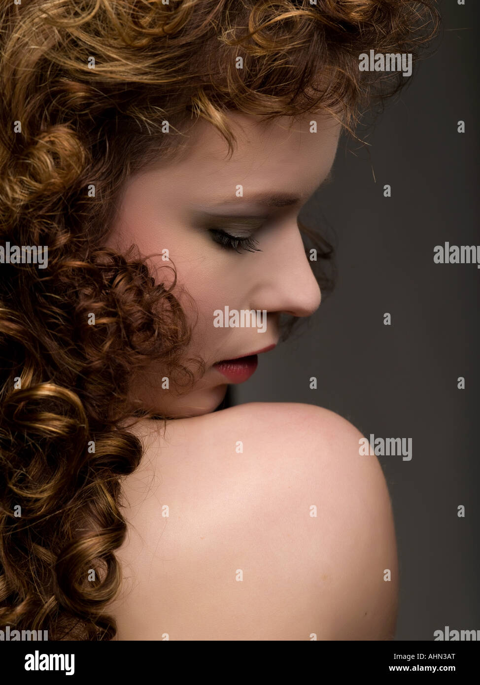 Looking over shoulder model hi-res stock photography and images - Alamy