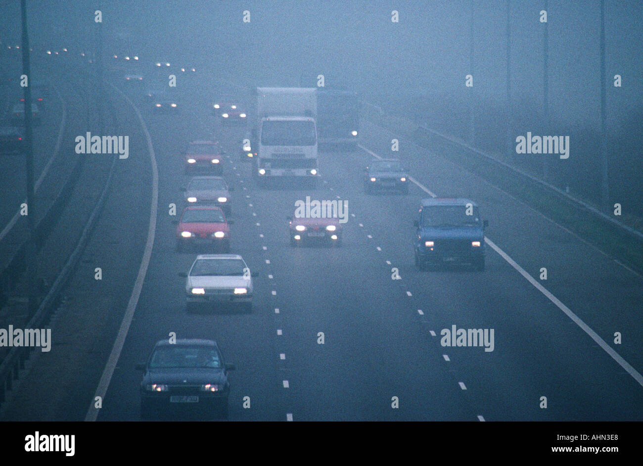Traffic in fog on the M1 Motorway in Northamptonshire England Stock ...