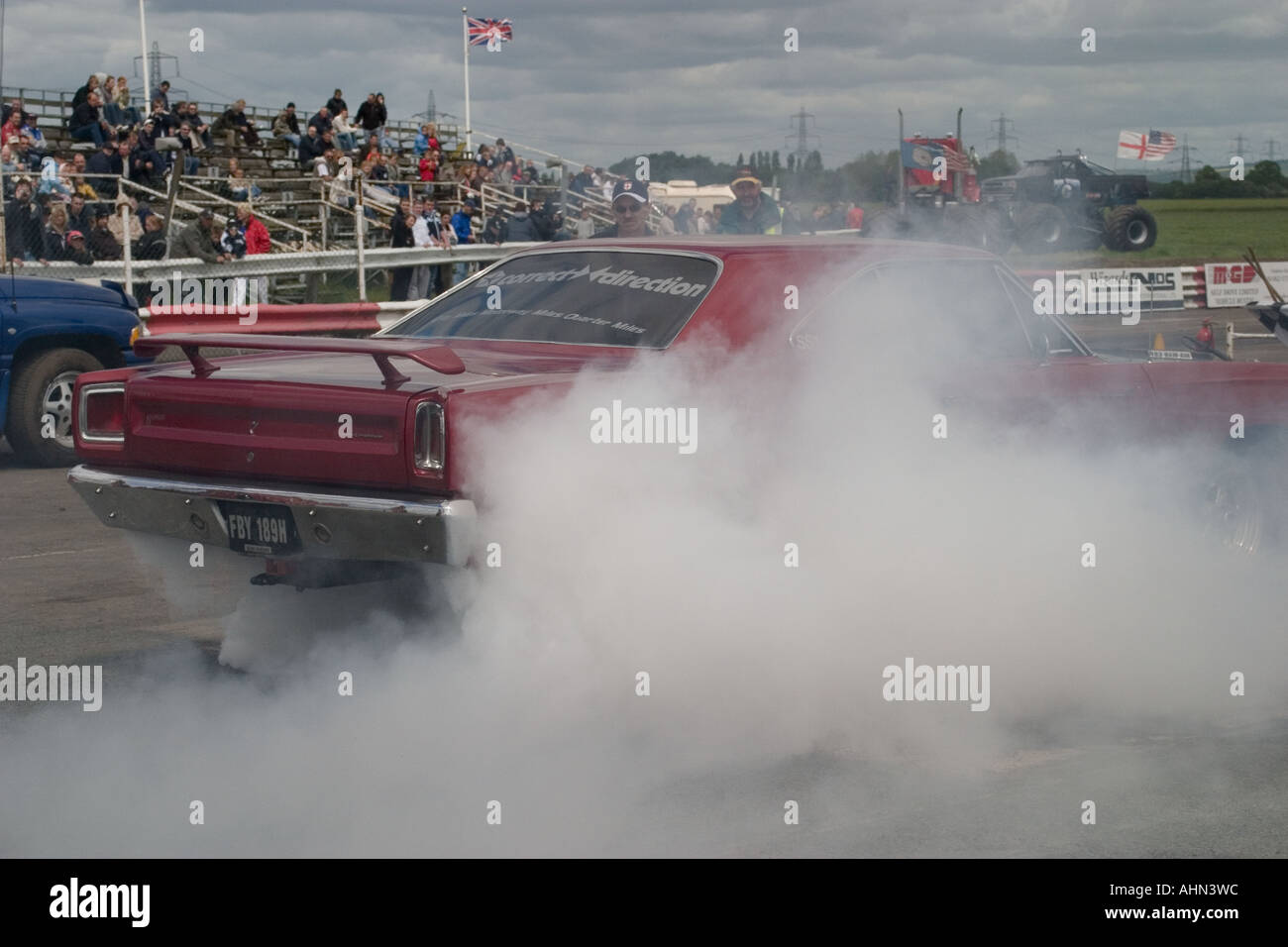 American car doing a burnout prior to start of drag race Stock Photo ...