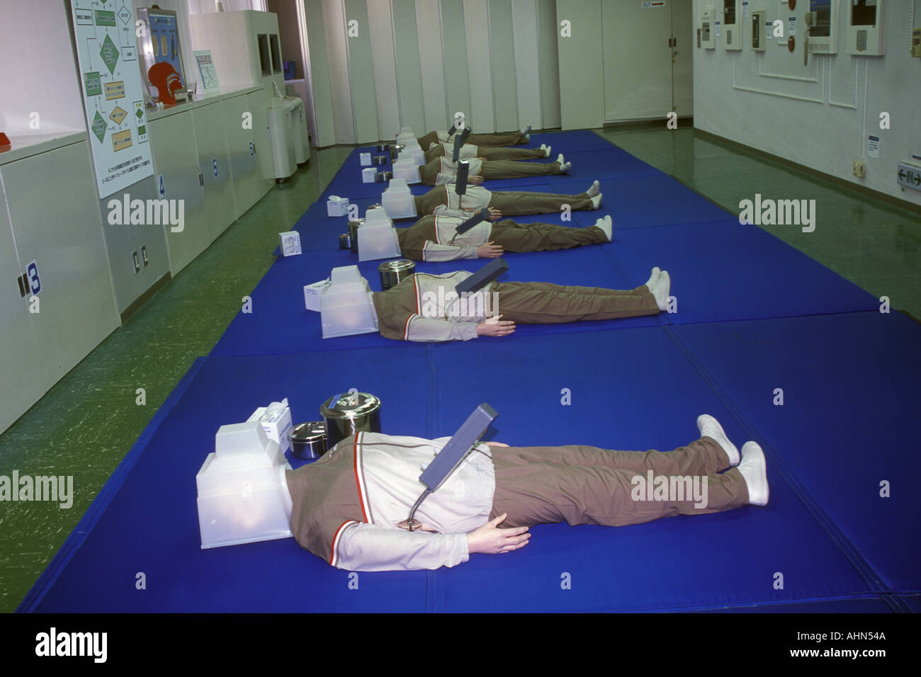 Human dummies in an artificial resusitation training room Earthquake ...