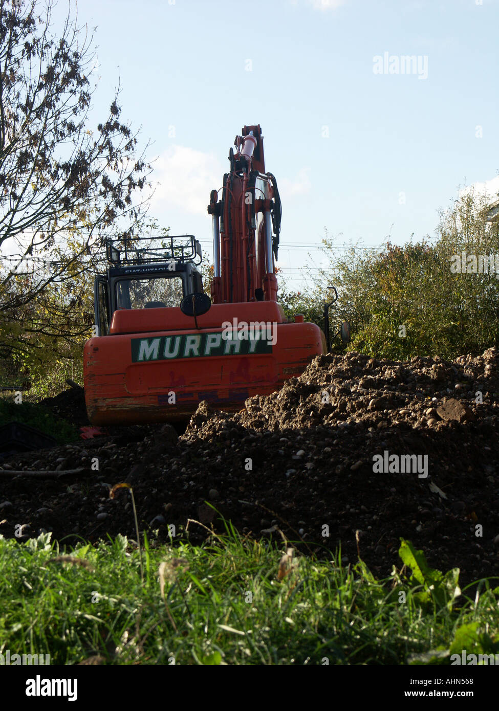 Earthmoving equipment or excavator or mechanical digger on a building ...