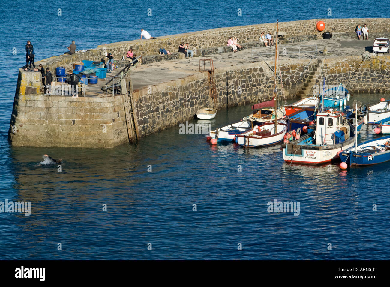 Boy diving Coverack harbour, Cornwall Stock Photo - Alamy