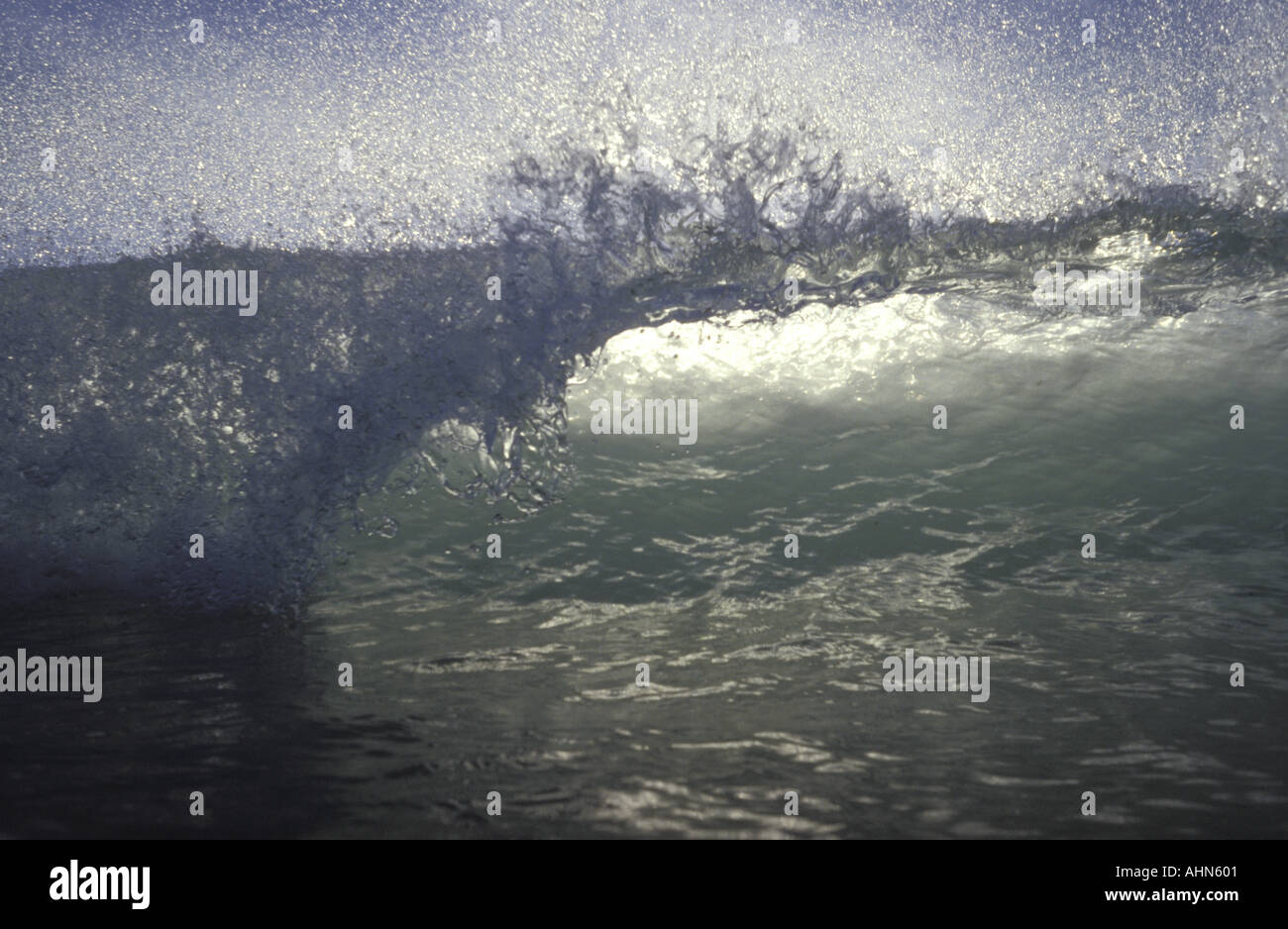 Sunlight through breaking waves hi-res stock photography and images - Alamy