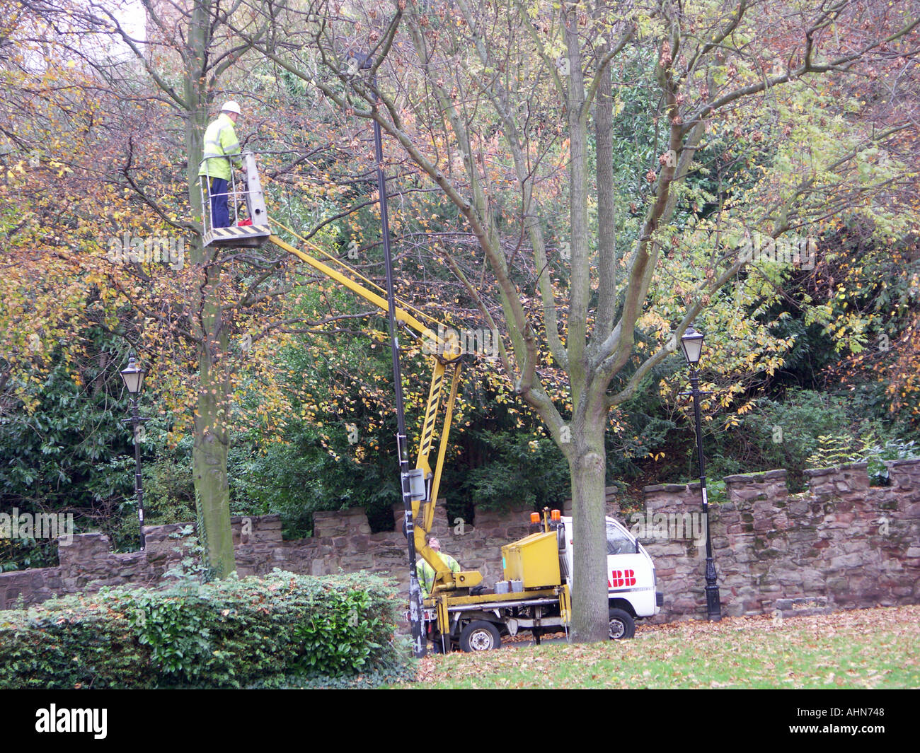 Lighting maintenance using mobile access platform 1 Stock Photo - Alamy