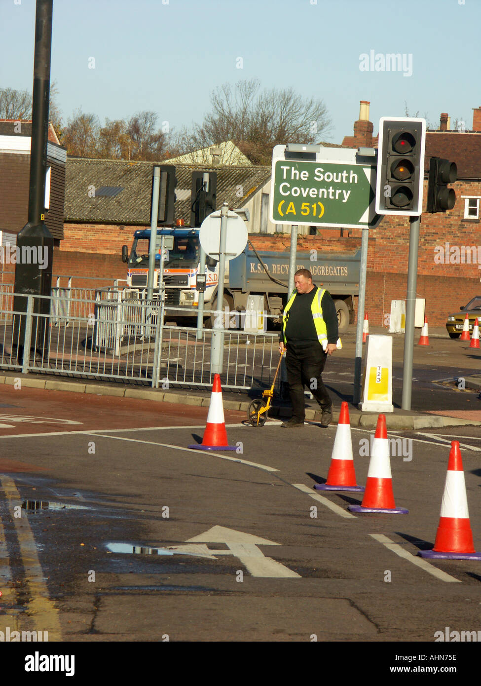Manual Traffic Control during roadworks 2 Stock Photo - Alamy