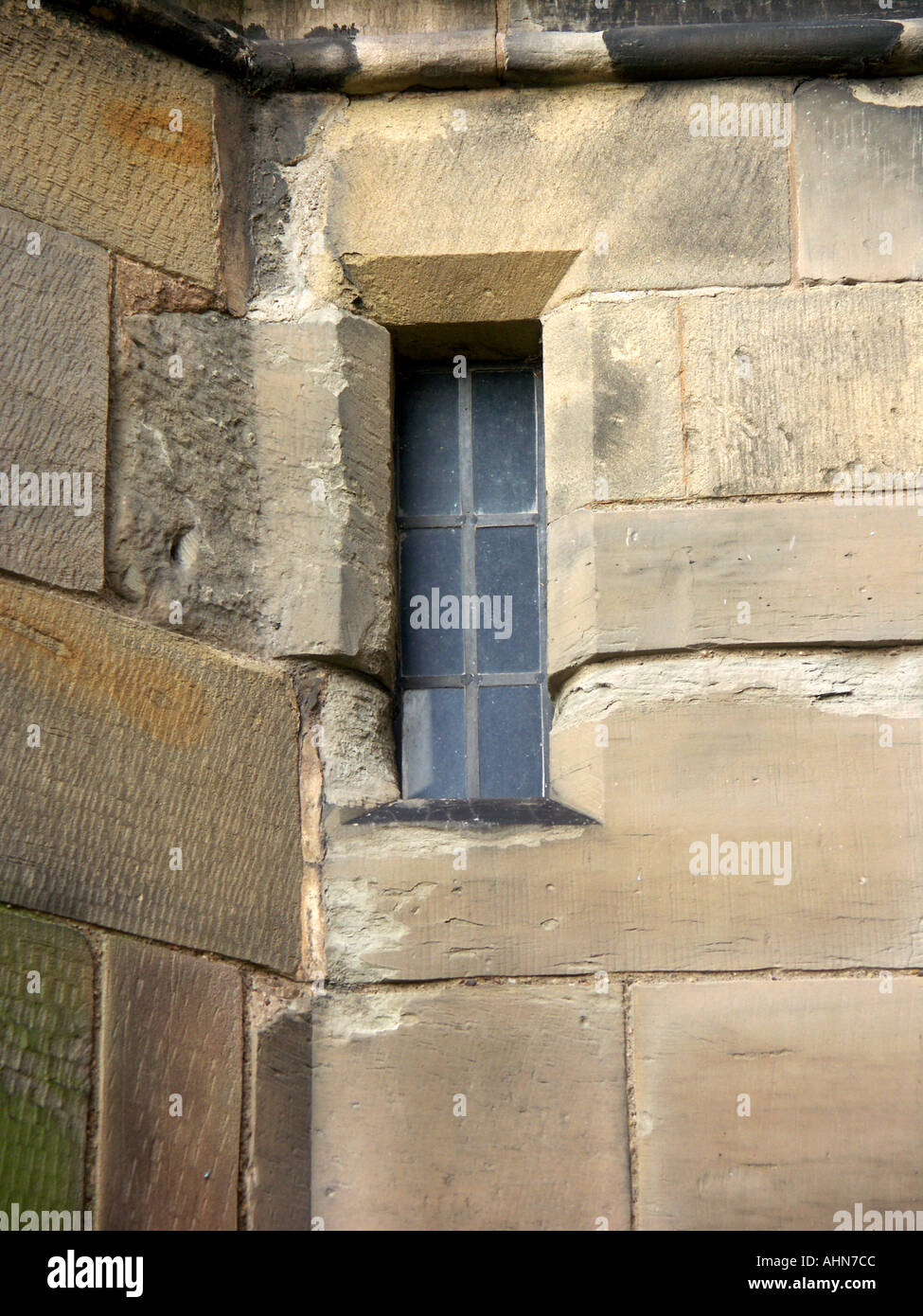 Small window detail in church tower Stock Photo - Alamy