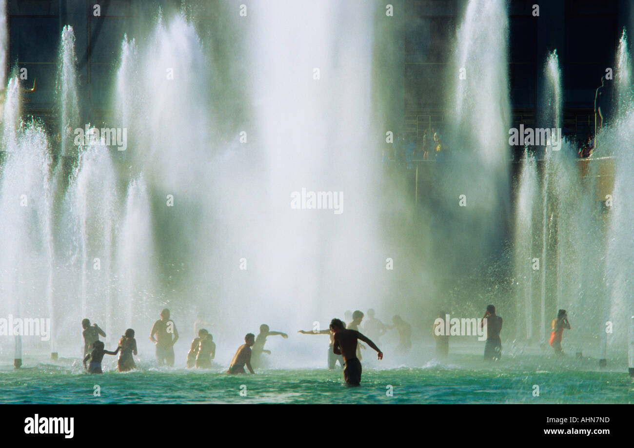 Heat wave summer hot weather Paris, France. People cooling off in water ...