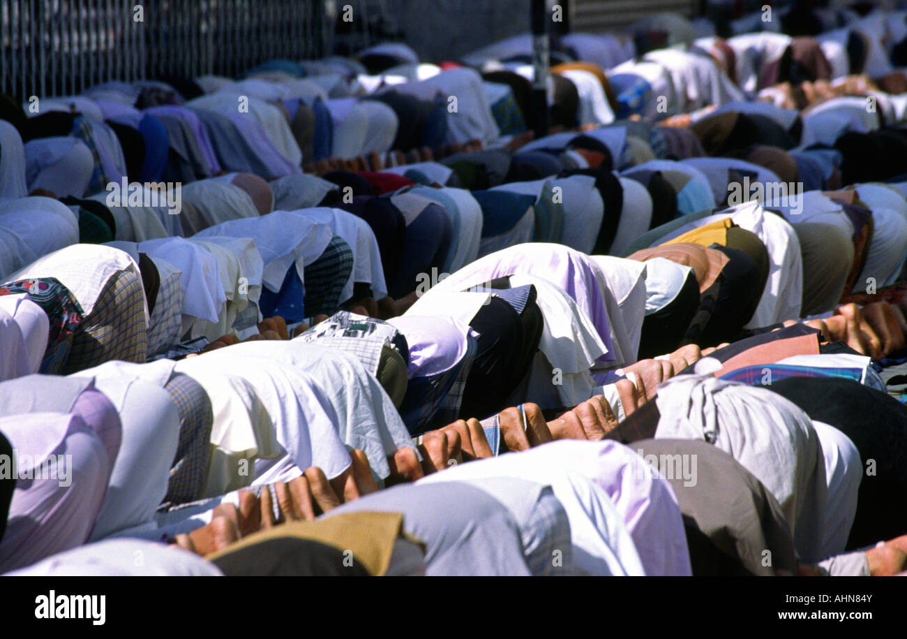 Dubai UAE Religion prostrate muslim worshippers praying in street ...