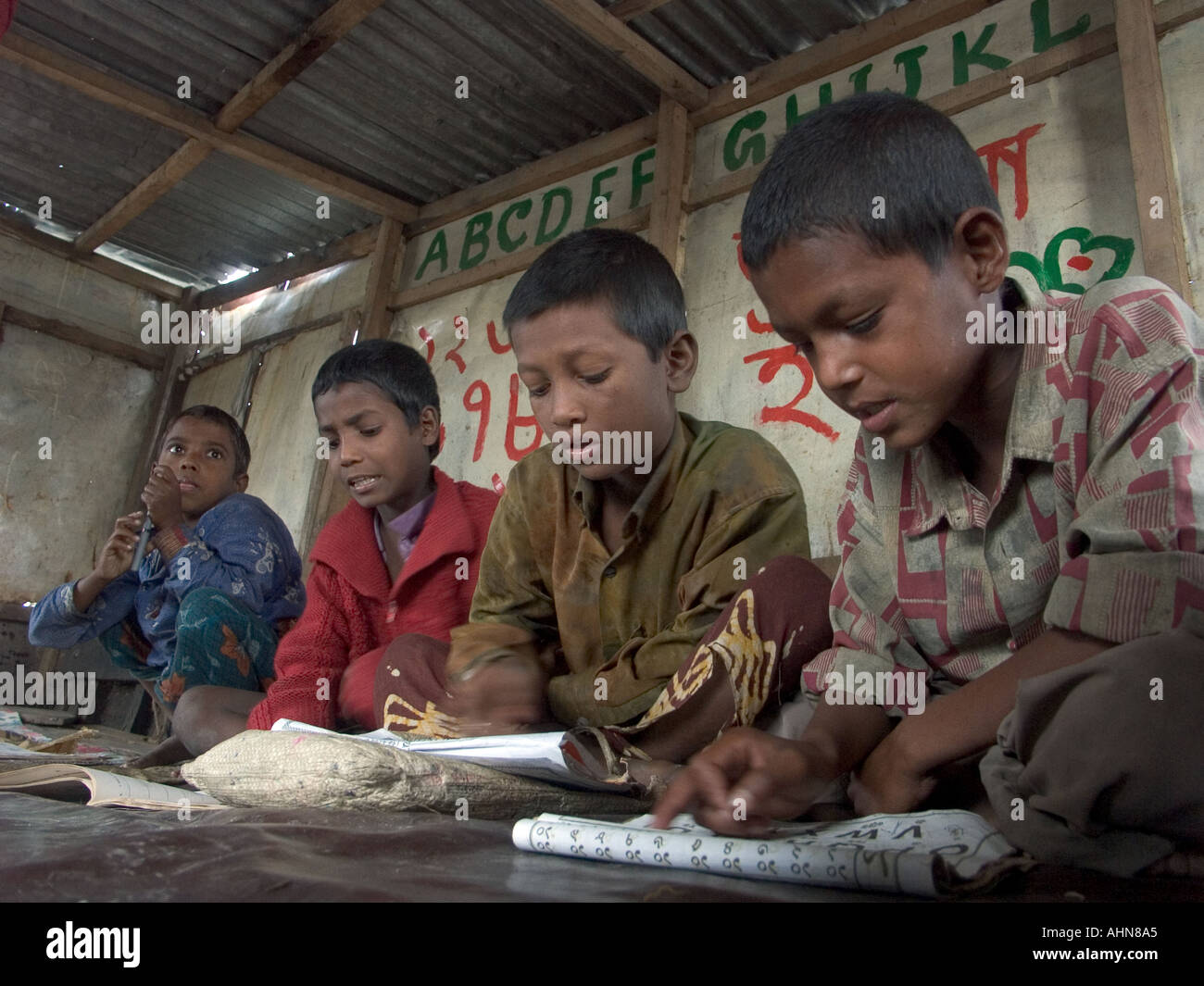 A school for poor children living on the river Stock Photo - Alamy