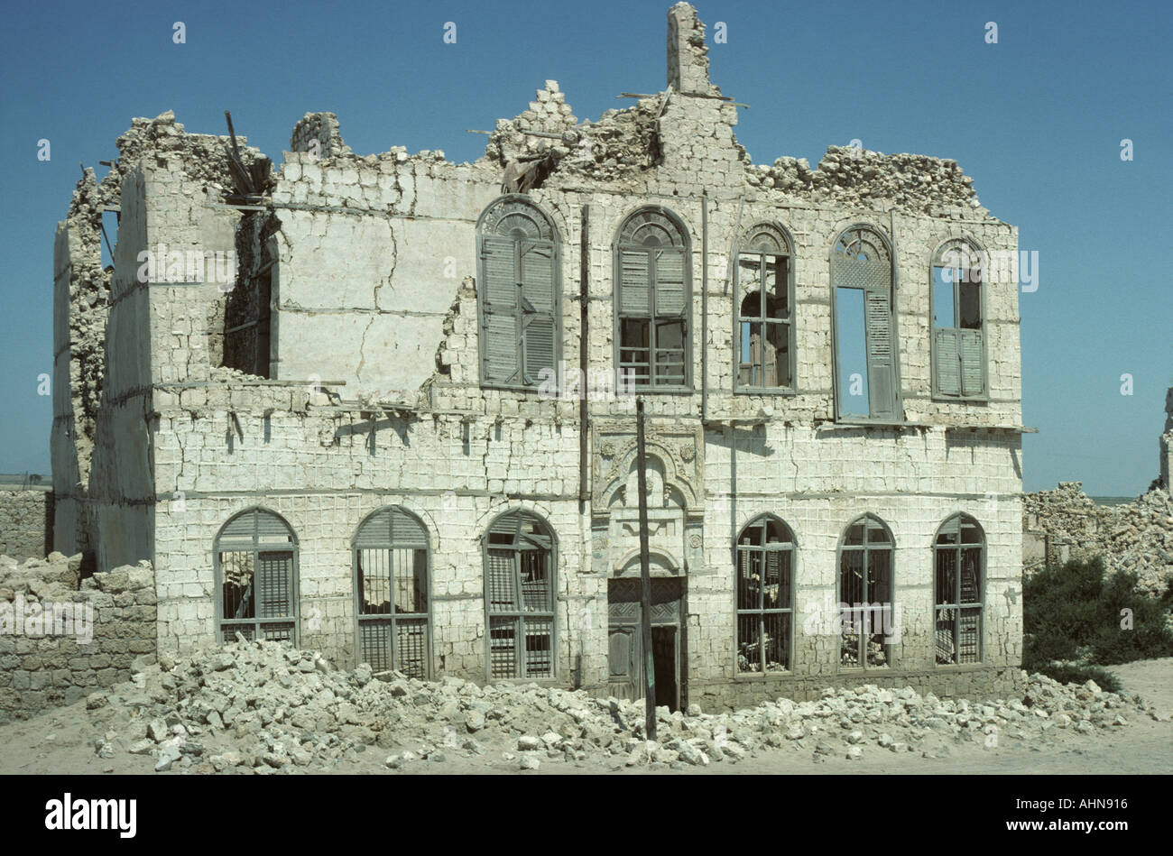 Crumbling ruins of old decorated Turkish house built of coral old ...