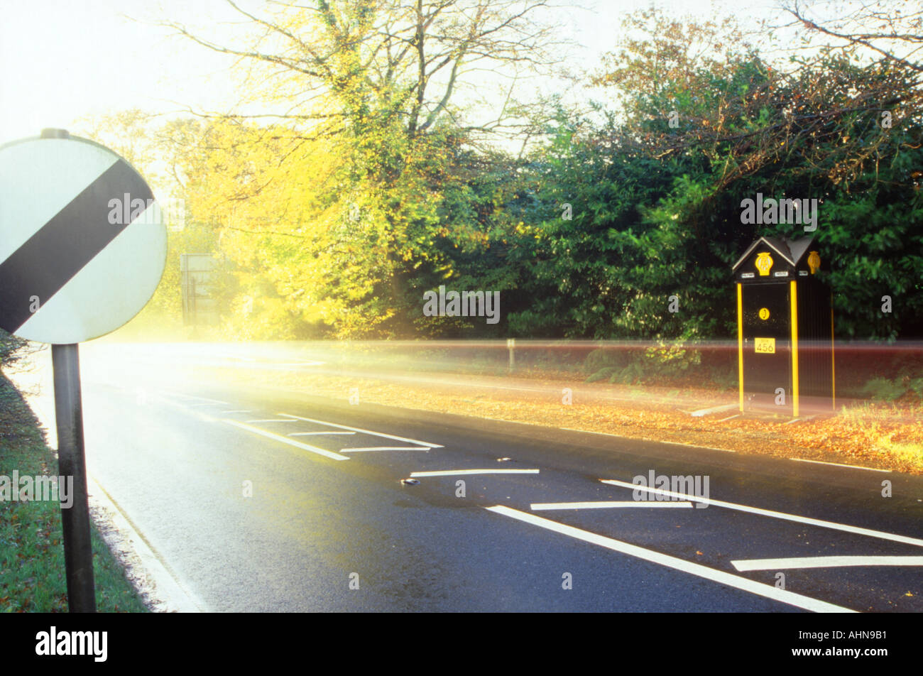 Car zooming past the AA call box Woodbury Devon UK Stock Photo - Alamy