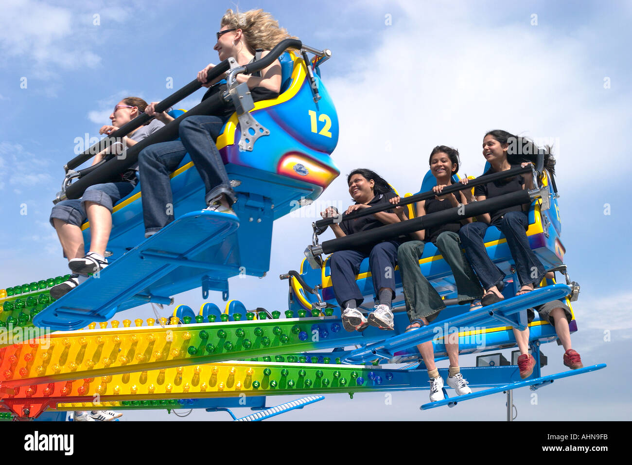 Girls on funfair ride on hi-res stock photography and images - Alamy