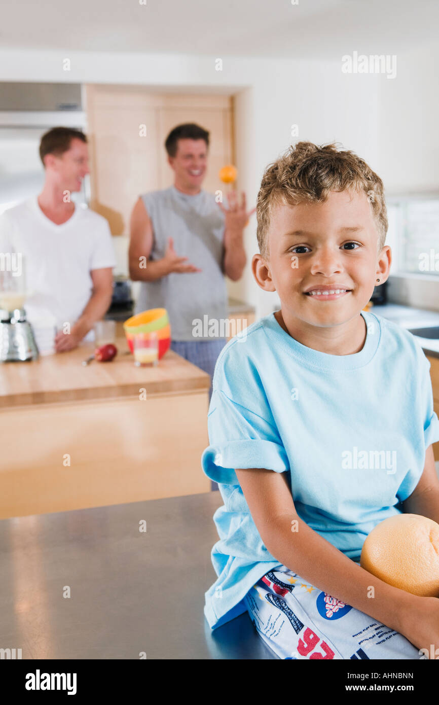 Boy sitting kitchen countertop hi-res stock photography and images - Alamy
