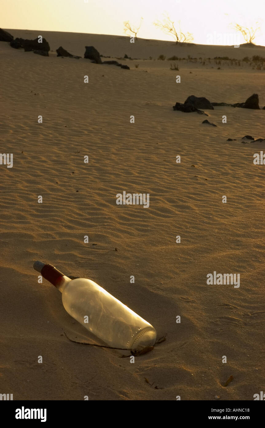 Empty bottle on sand hi-res stock photography and images - Alamy