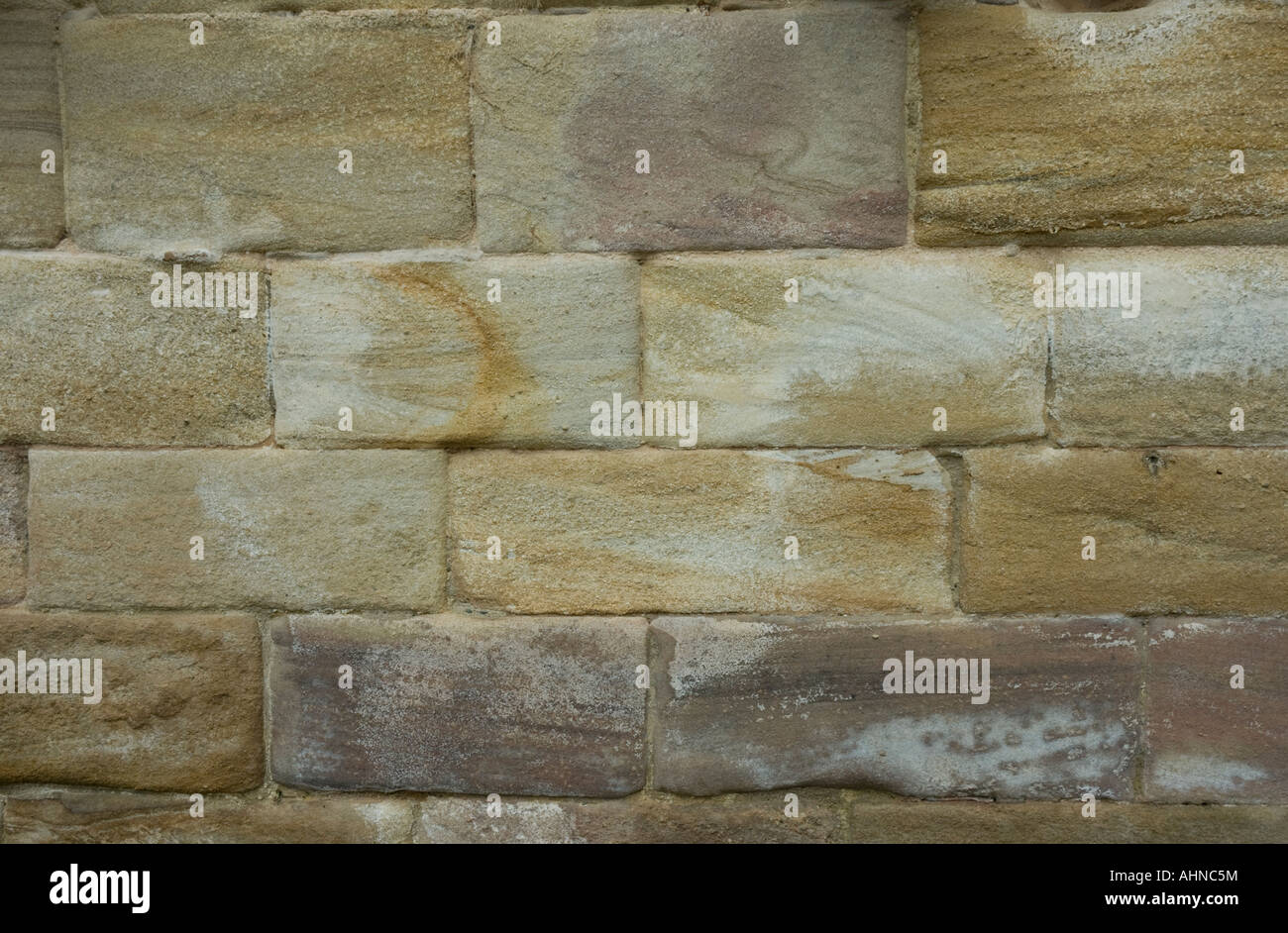 Sandstone stone wall Stock Photo - Alamy