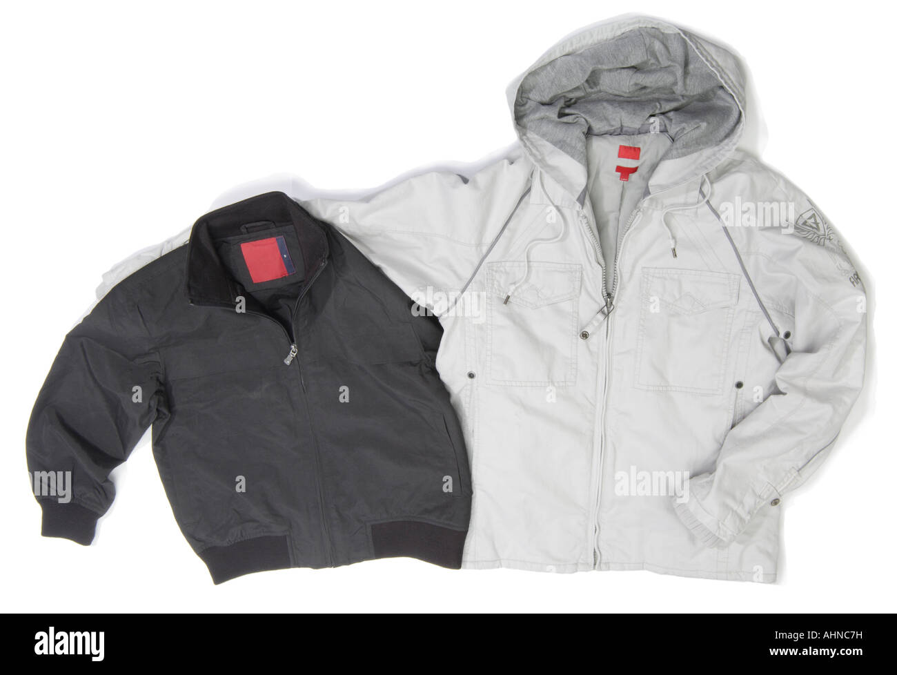 Two jackets one arm over the other Stock Photo - Alamy