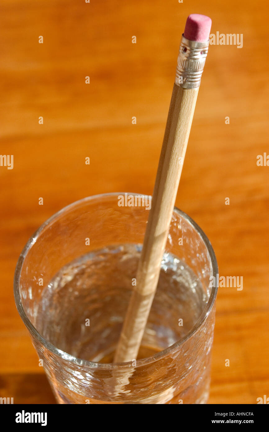 crayon in a full water glass Stock Photo - Alamy
