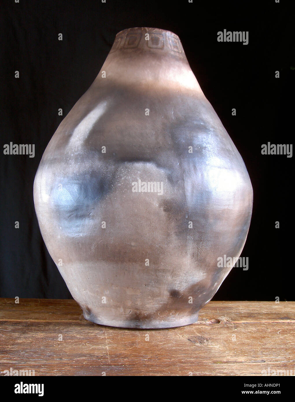 Smoke fired coil pot with inlay design Stock Photo - Alamy