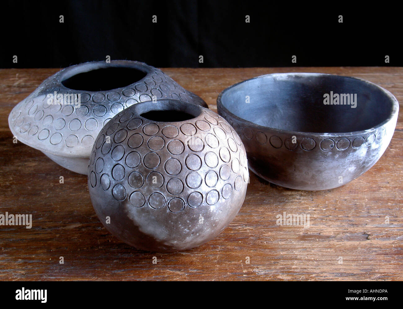 Collection of small smoke fired pots Stock Photo - Alamy