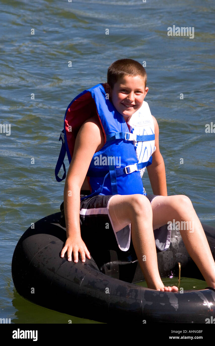 Boy wearing lifejacket hi-res stock photography and images - Alamy