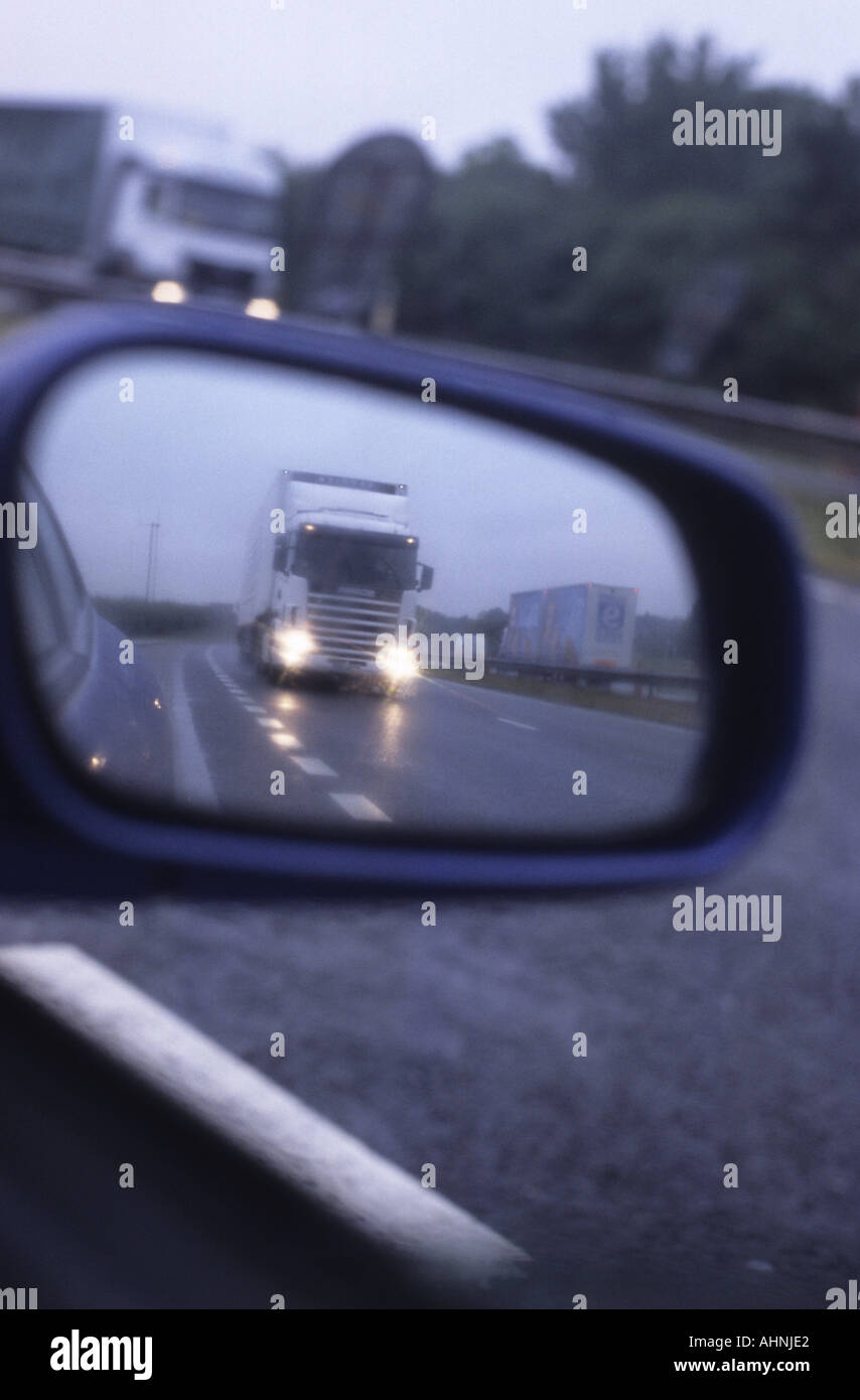 lorry reflected in vehicle wingmirror during heavy rain on the A1 M1 ...